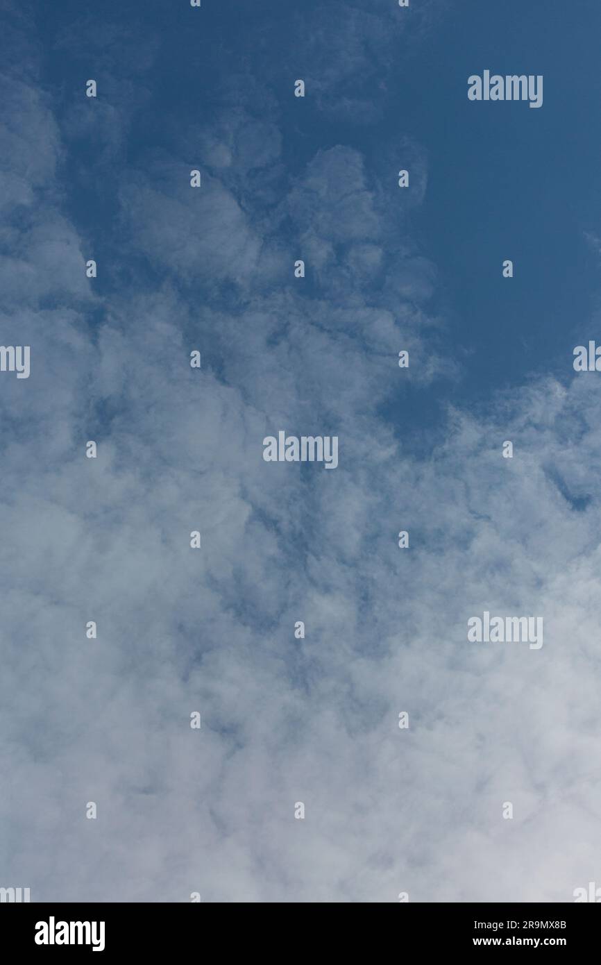 Image of a partly cloudy and partly clear sky during the day without ...