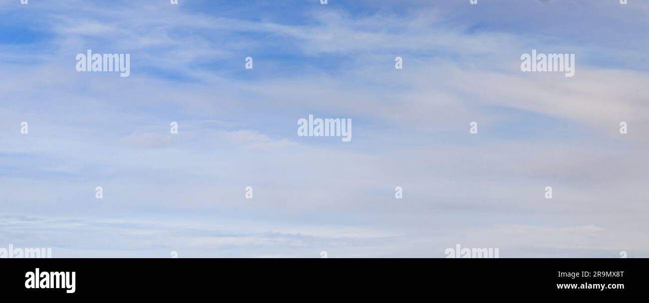 Image of a partly cloudy and partly clear sky during the day without ...