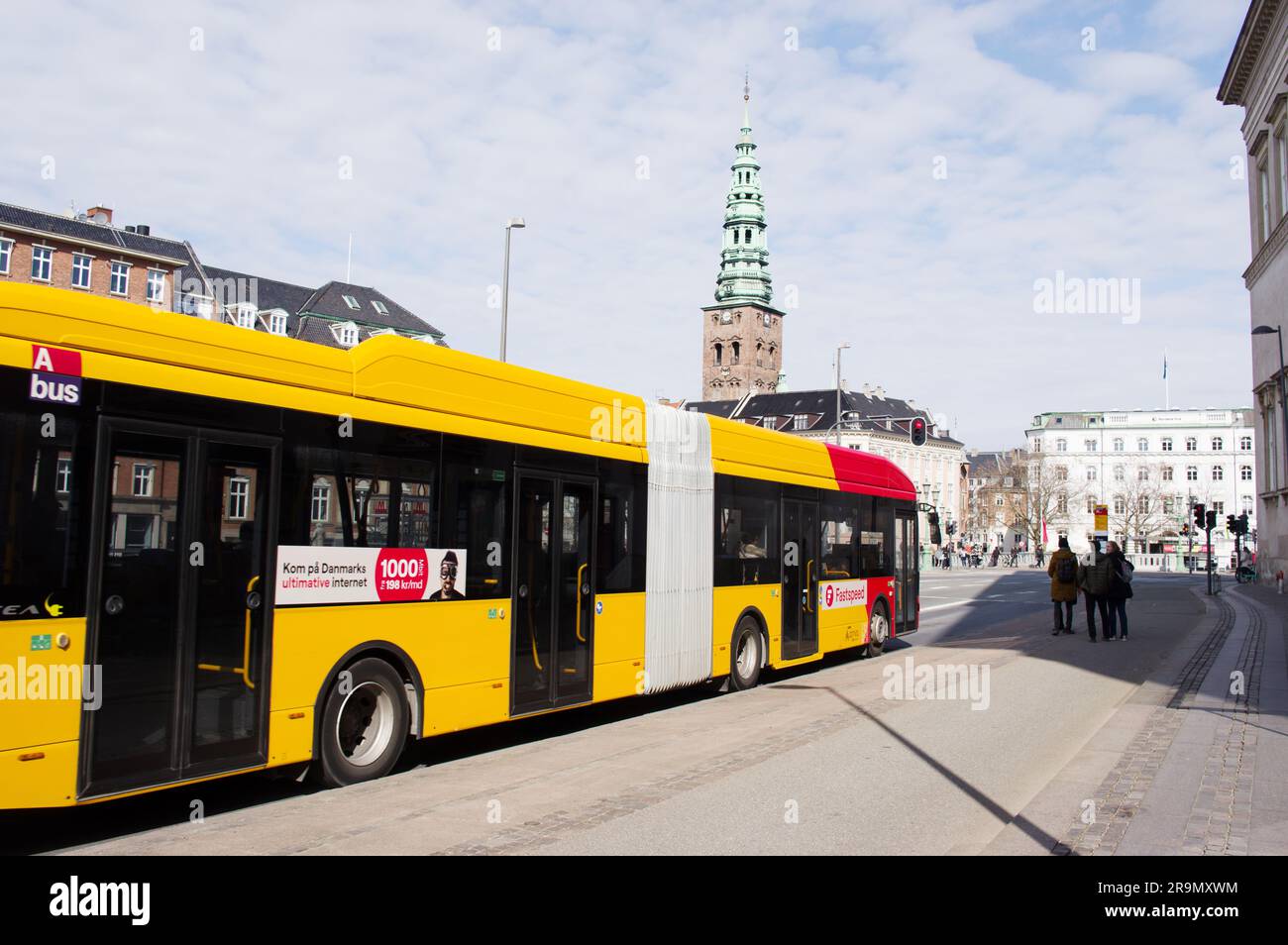 Copenhagen, Denmark - April 9, 2023: Yellow and red city bus in the ...