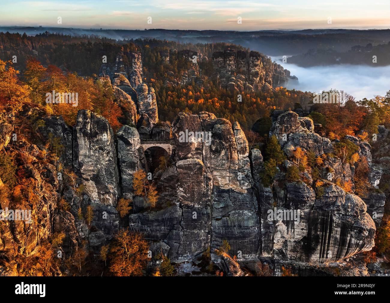 Saxon, Germany - Aerial view of the Bastei Bridge on a foggy autumn ...