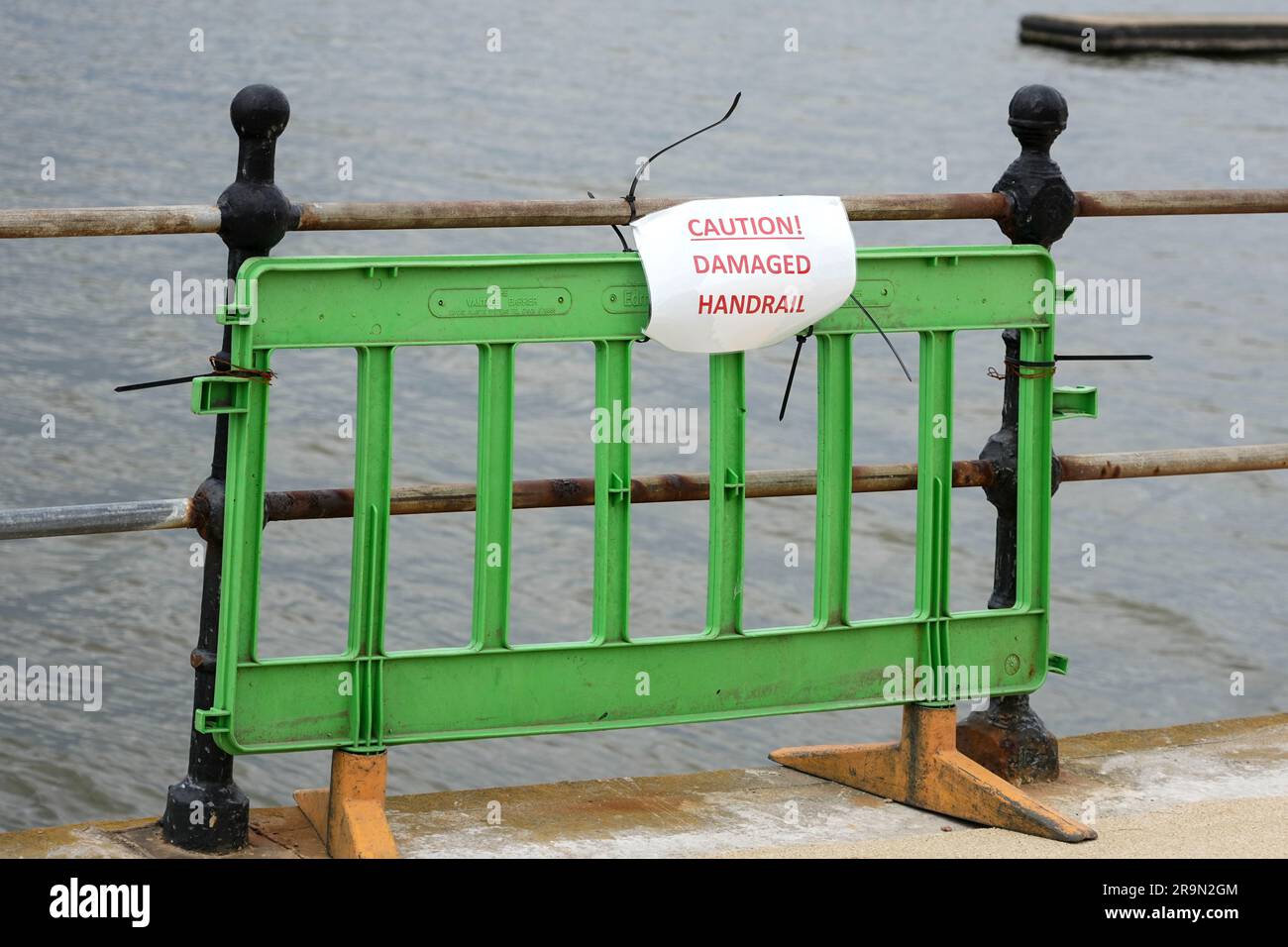 Damaged steel railing West Kirkby Promenade Stock Photo - Alamy