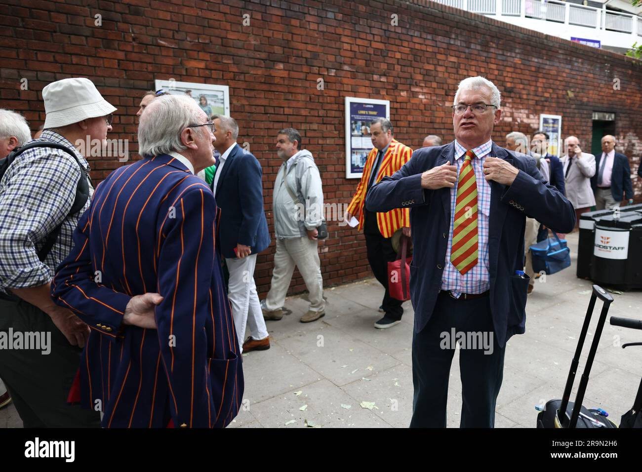 London, UK. 28th June, 2023. Members of the MCC queue outside Lords ...