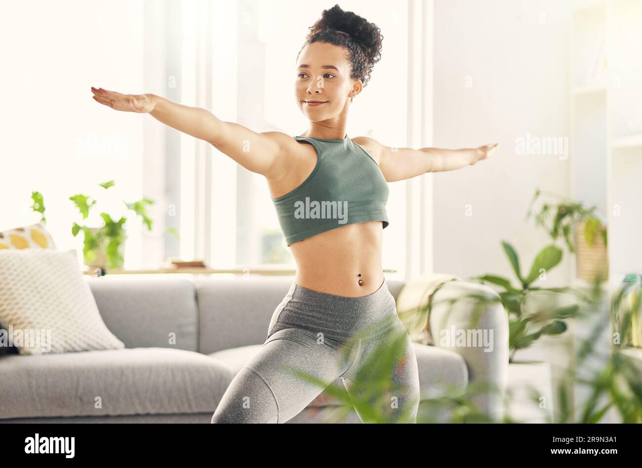 Body, stretching and happy woman with yoga pose in a living room for ...