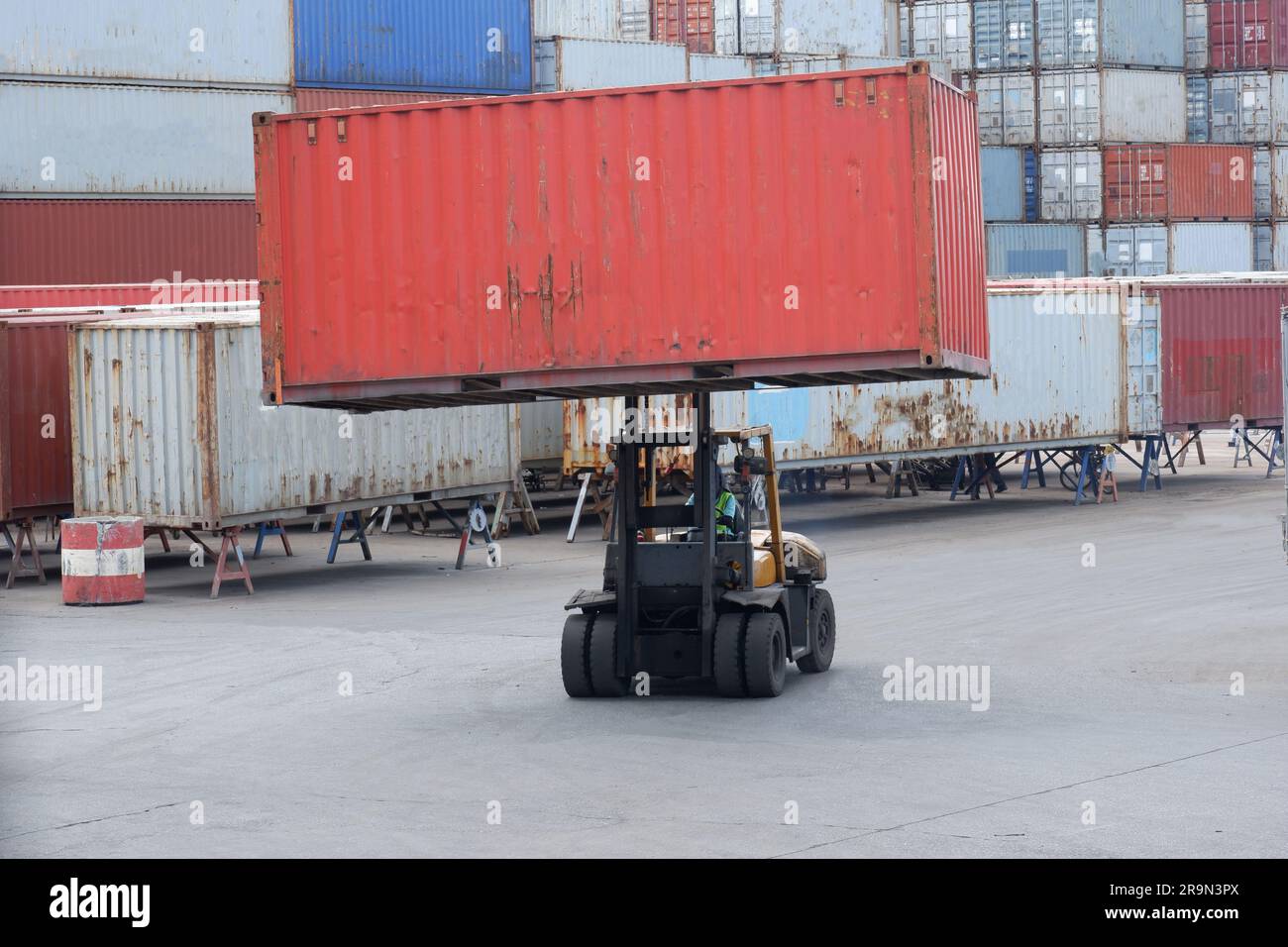 Forklifts lift containers and container warehouses, trade view Stock ...