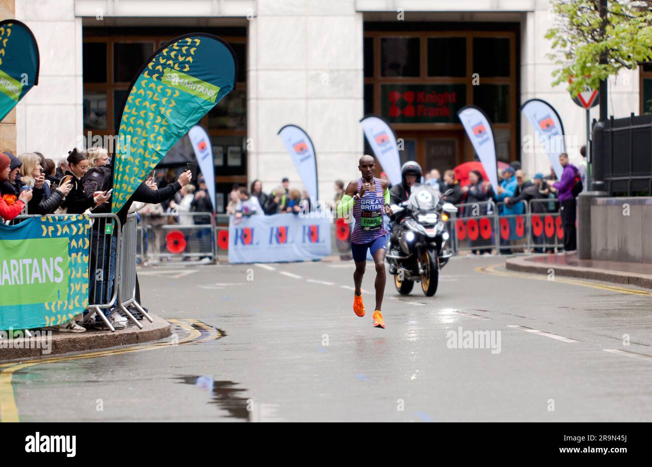 Sir Mo Fara, passing through Cabot Square, in the men's elite race. He ...