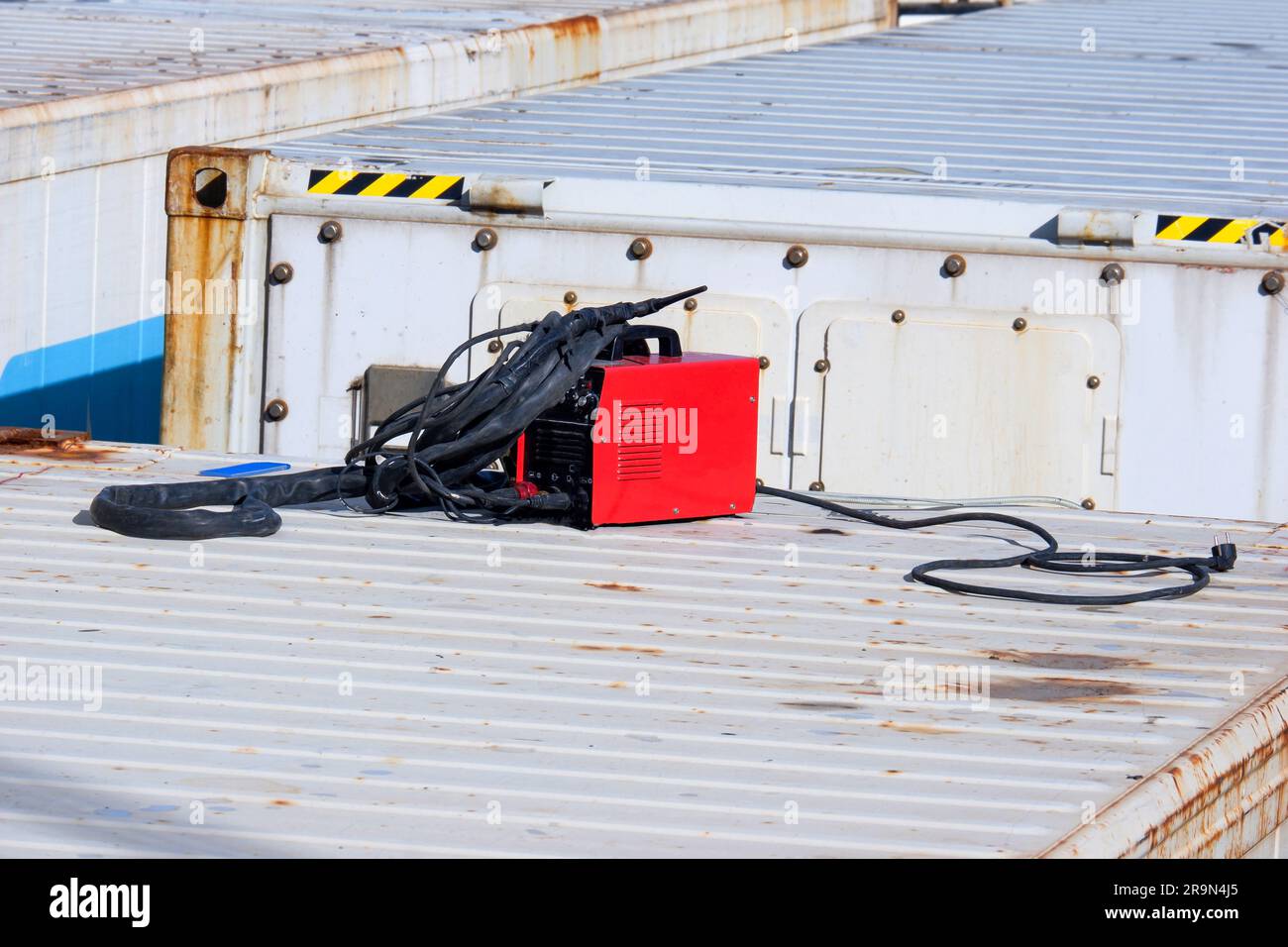 welding machine on the container Stock Photo - Alamy