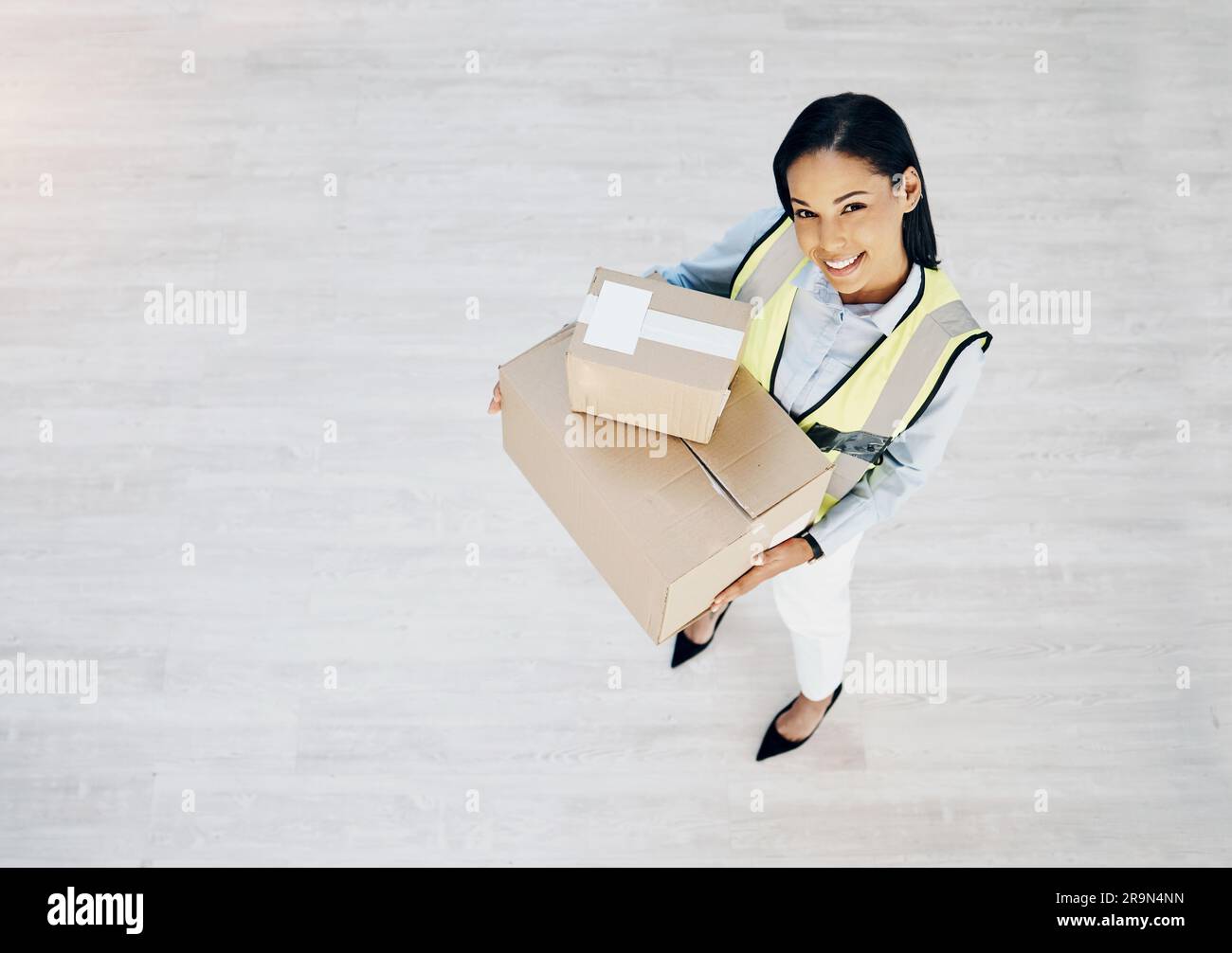Courier, boxes and portrait of delivery woman from above for logistics ...