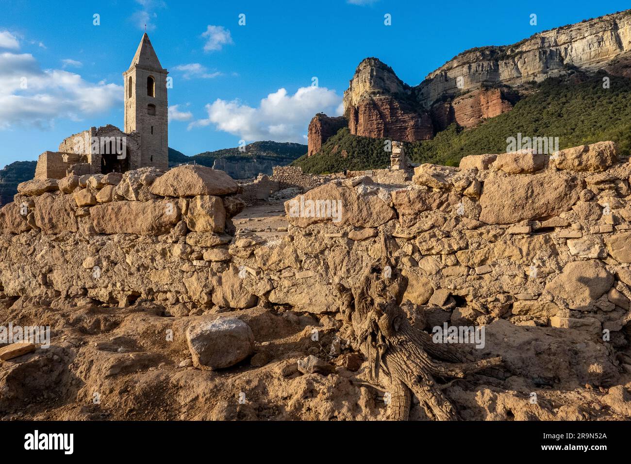 Sau reservoir and Sant Romà de Sau church during a drought, Osona ...