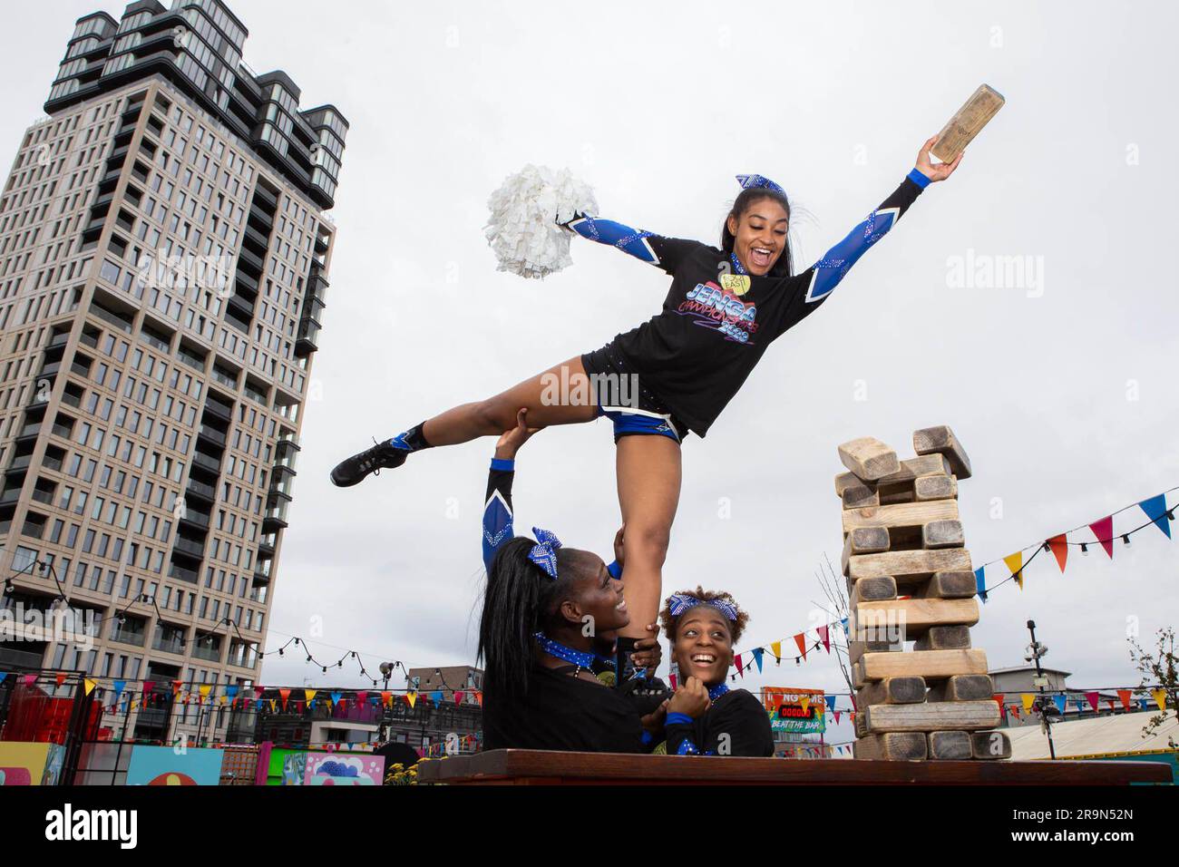 EDITORIAL USE ONLY Cheerleaders from Marshals Cheer & Dance play Jenga ...