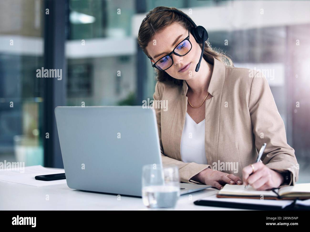 Call center, writing and business woman, laptop and planning for ...