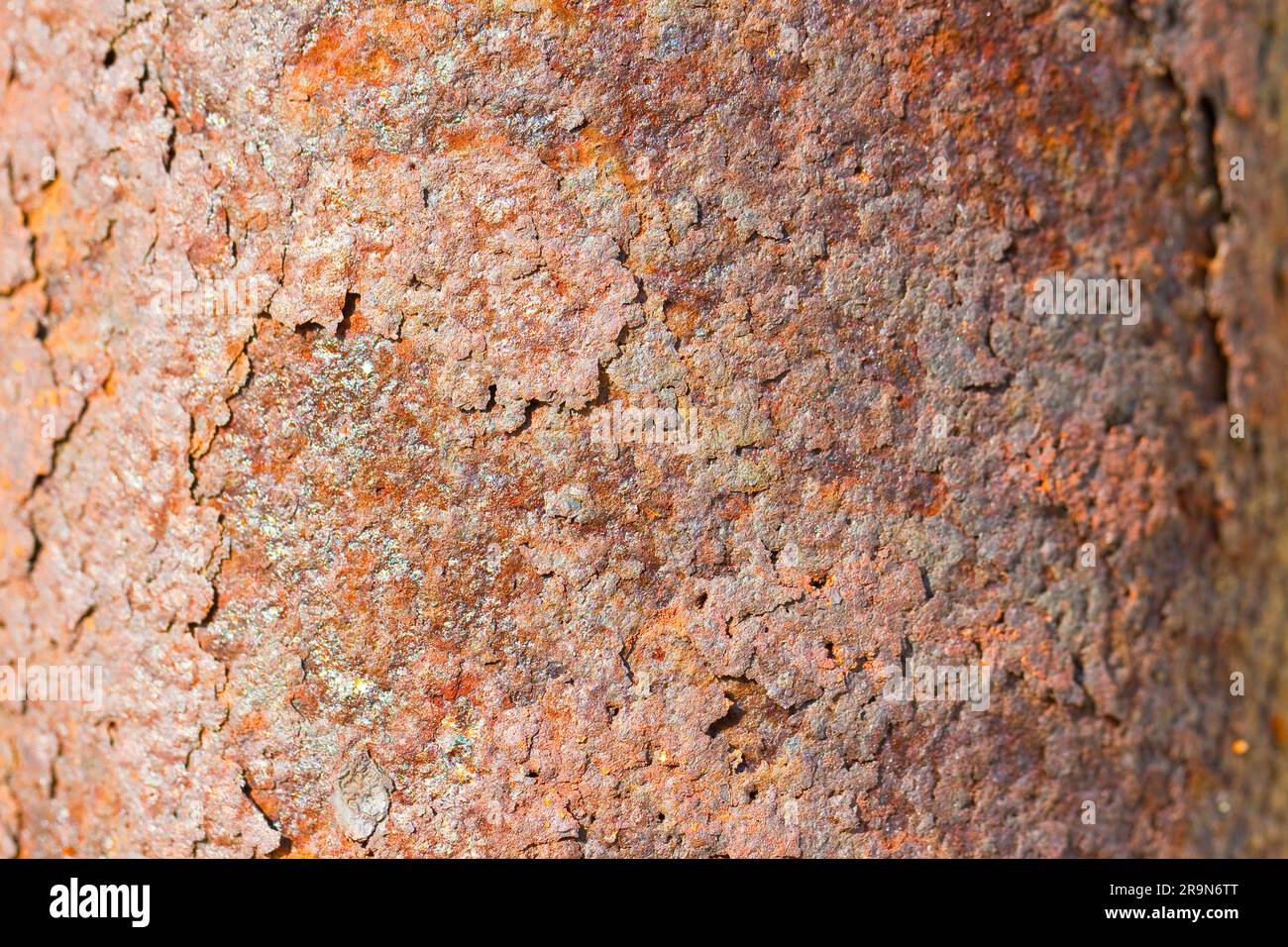 Rusty metal plate front view with rust flakes that are breaking away ...