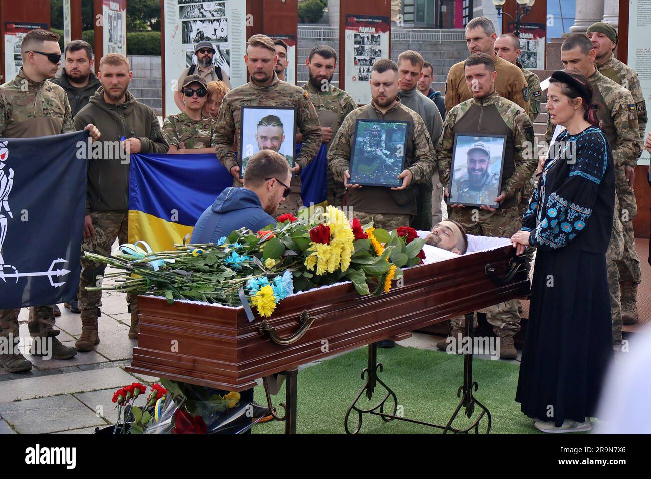 (EDITORS NOTE: Image depicts death)Relatives and friends cry near the ...