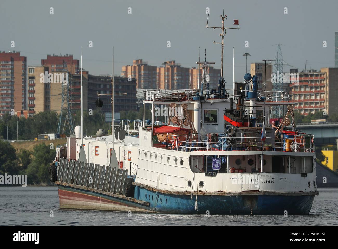 27.06.2023. Russia. Moscow. Cargo ship in the water area of the ...