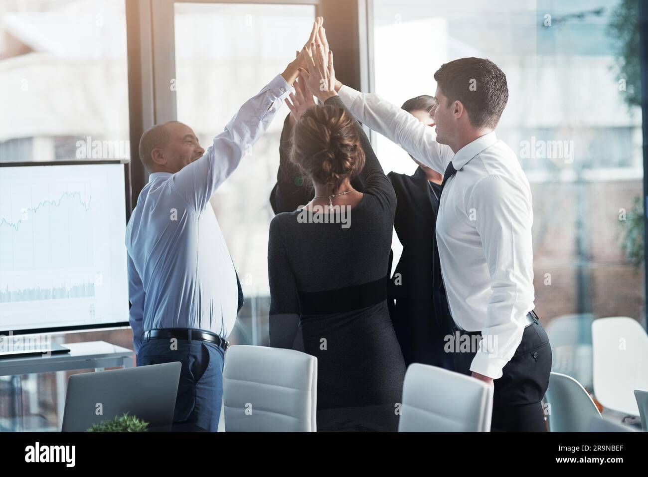 Business people, meeting and high five, team building and winning with success, celebration and ...