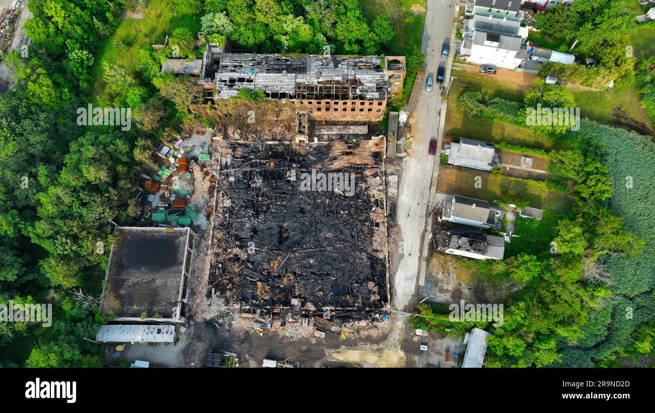Aerial view of burned down warehouse in South River, NJ next to ...