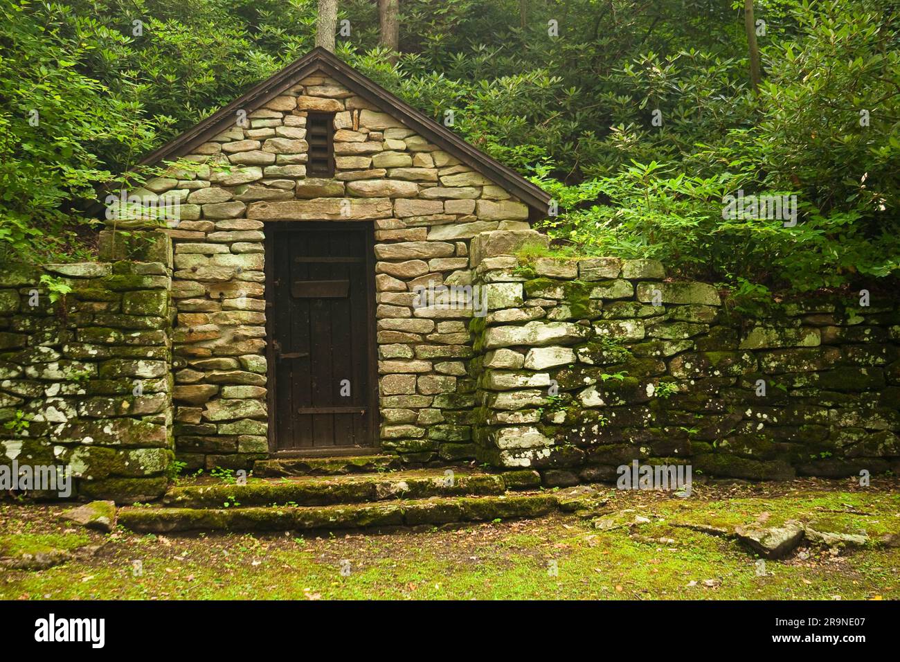 An old pump house in the woods Stock Photo - Alamy