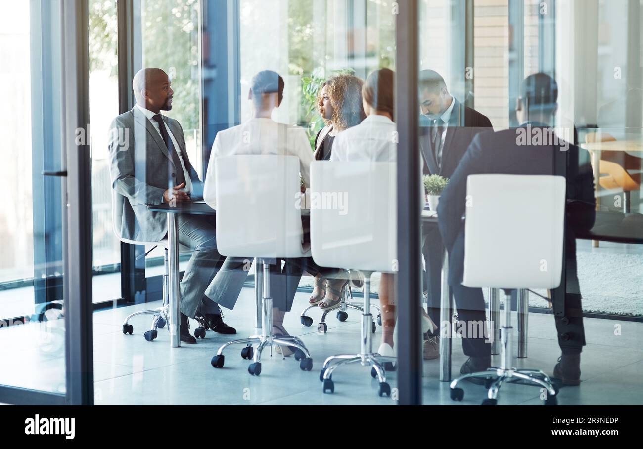 Boardroom, discussion and teamwork with solution and leader at company ...