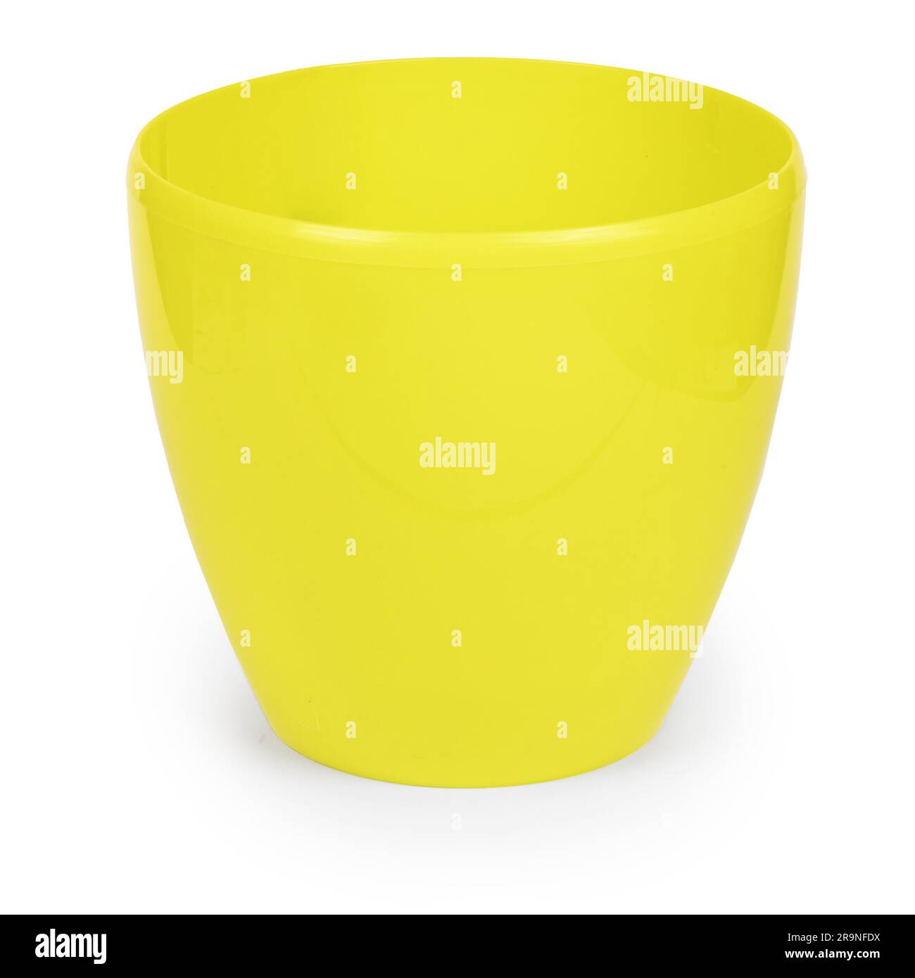Empty yellow flower pot isolated on white. Pastel shades. High ...