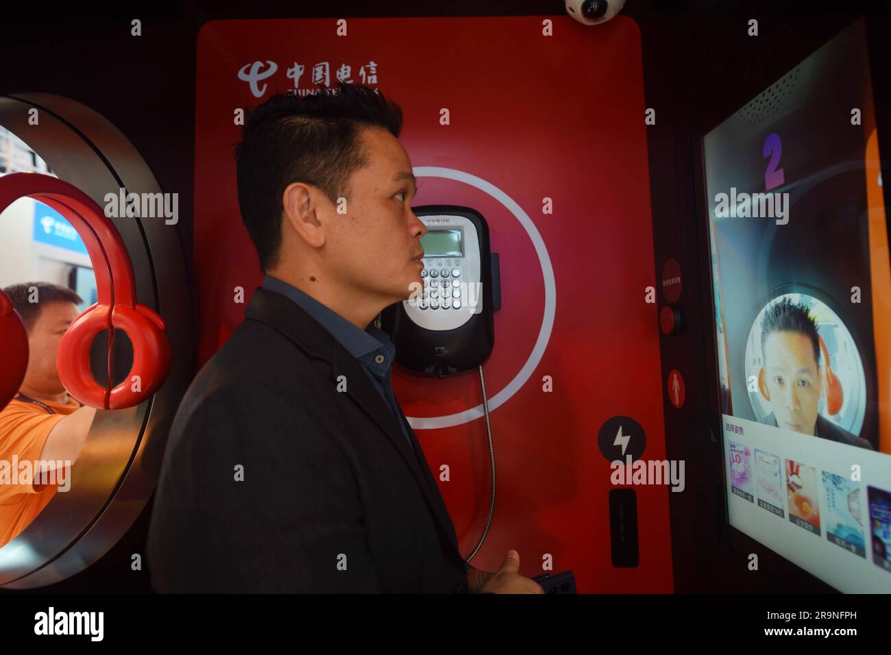 SHANGHAI, CHINA - JUNE 28, 2023 - Visitors experience smart phone ...