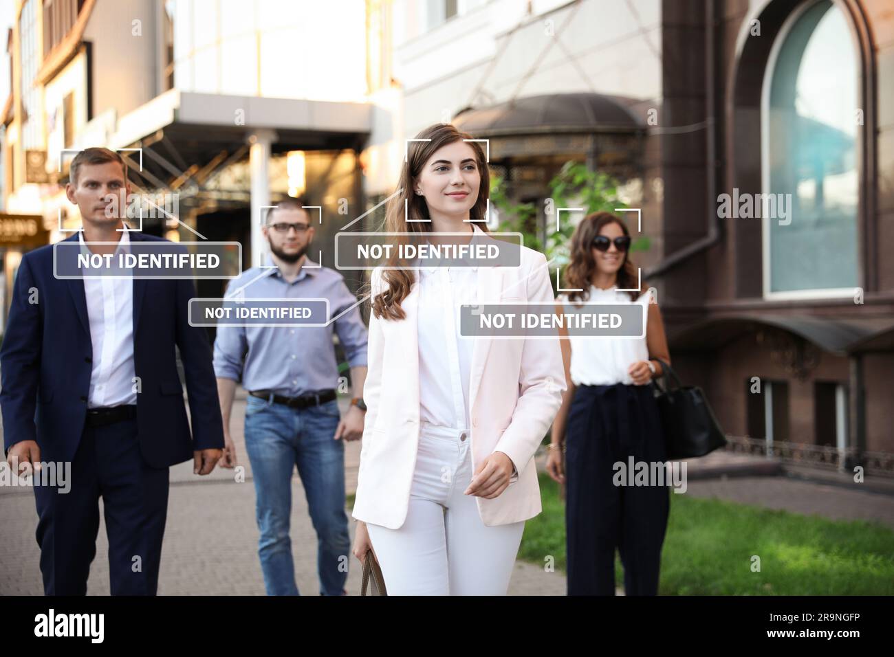 Facial recognition system identifying people on city street Stock Photo ...