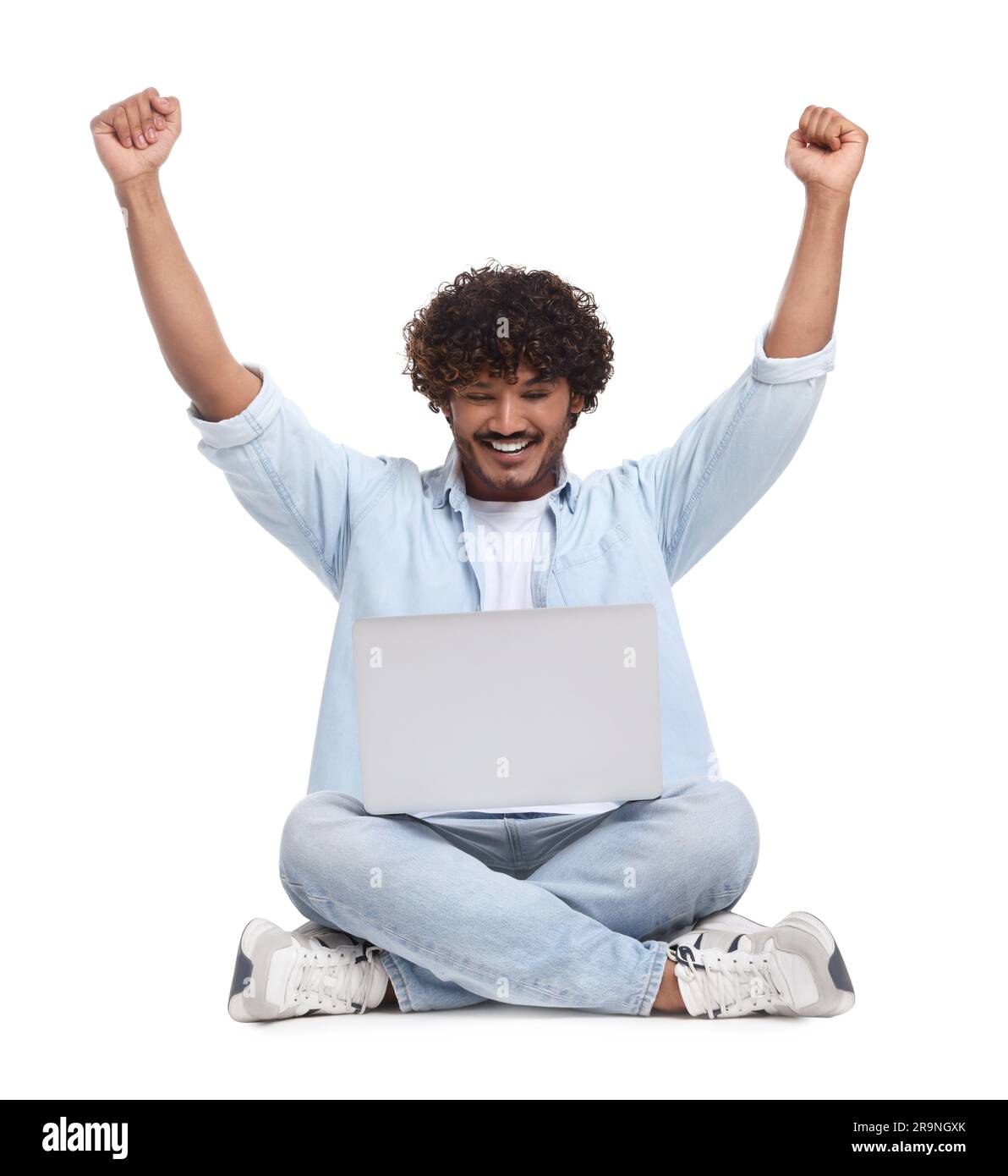 Happy man with laptop on white background Stock Photo - Alamy