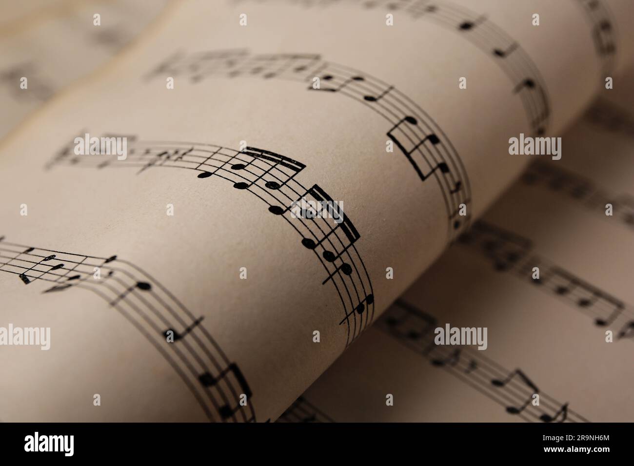 Closeup view of sheets with music notes Stock Photo - Alamy