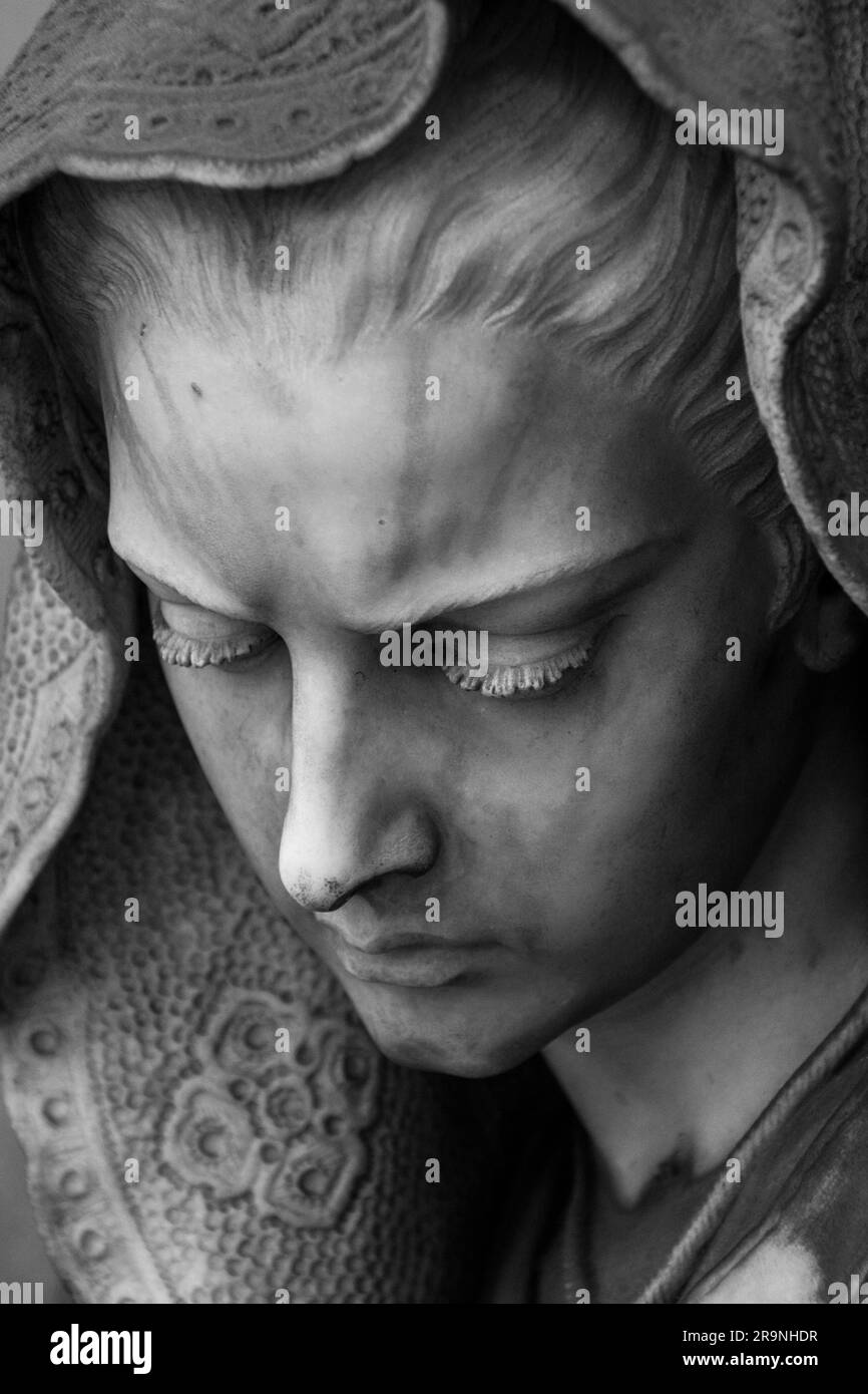 A detail of a statue in the Monumental Cemetery of Staglieno, Genoa ...