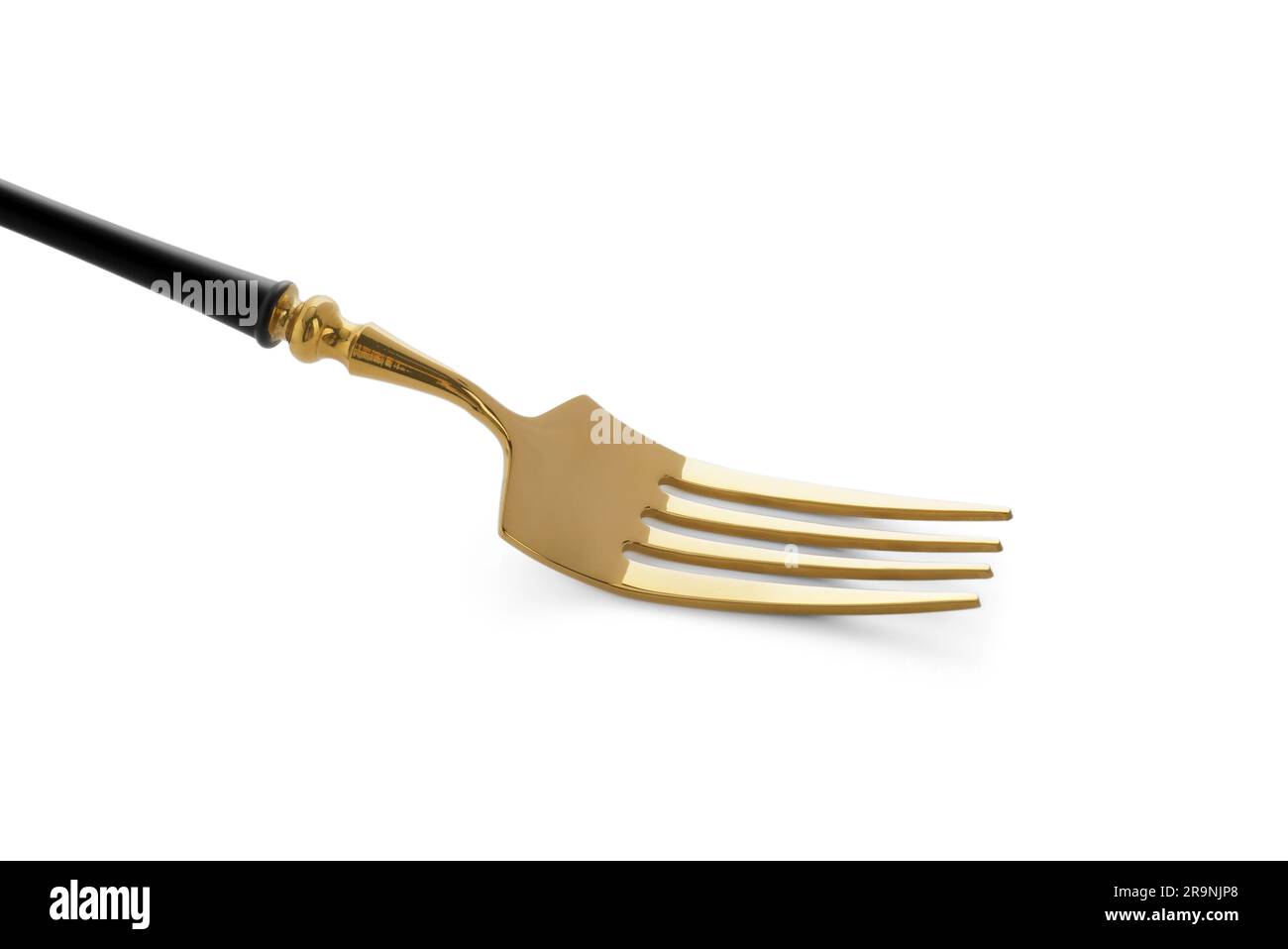 One shiny golden fork isolated on white Stock Photo - Alamy