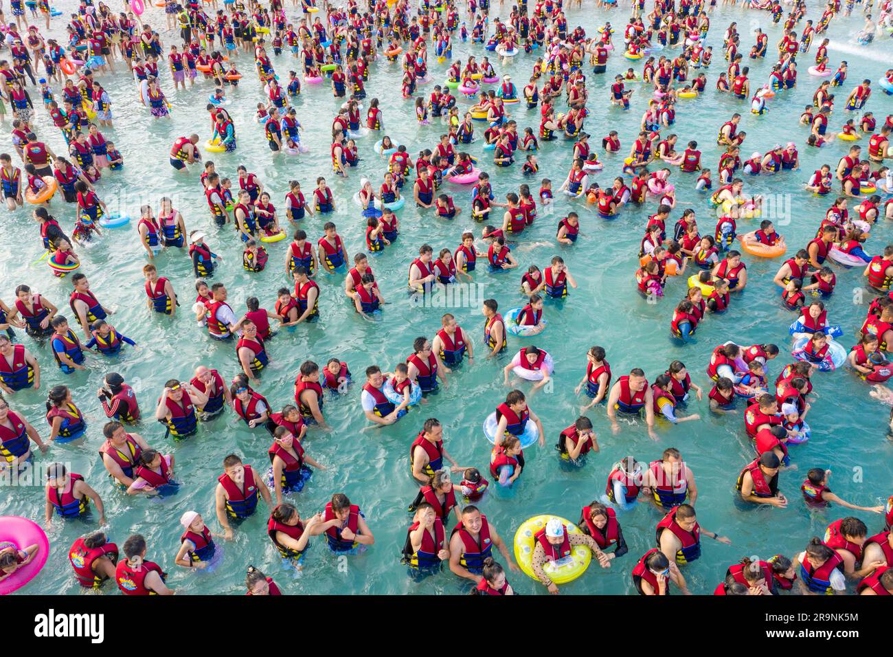 People have fun in a water park in Zhengzhou in central China's Henan ...