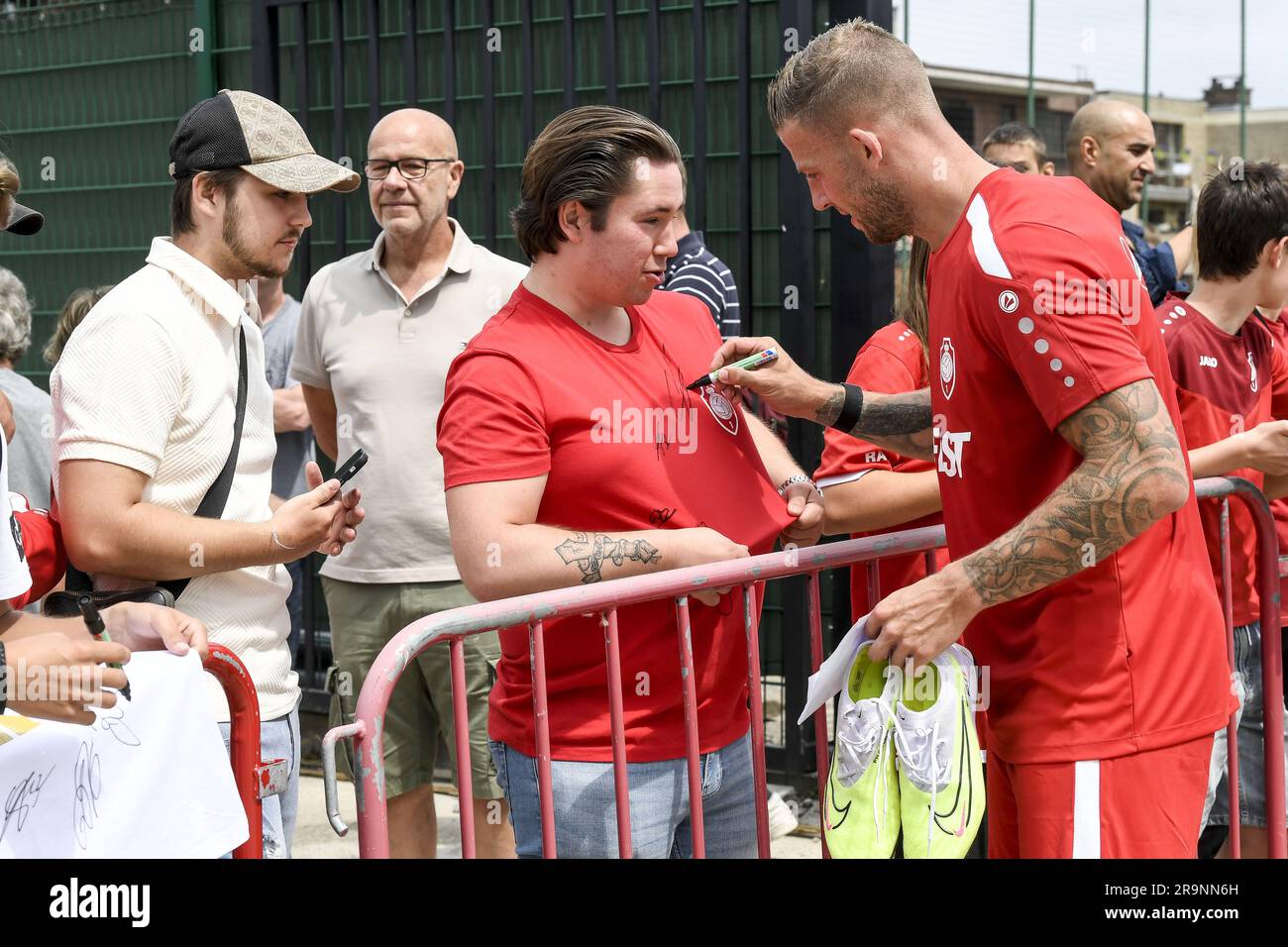 Antwerp's Toby Alderweireld signs an autograph during a training ...