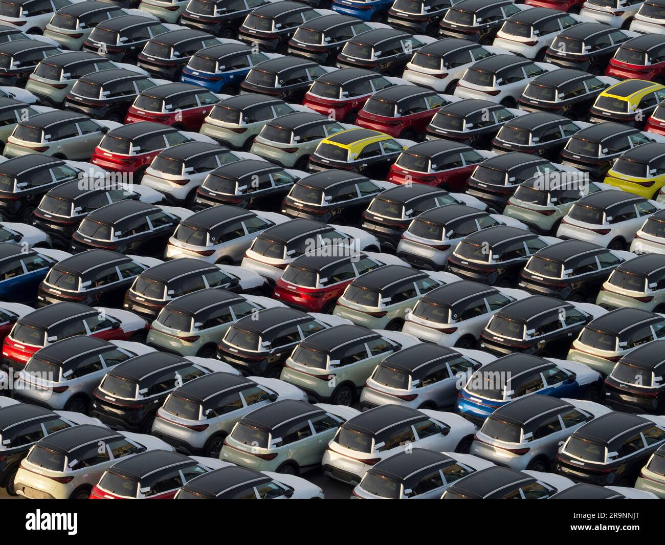 Pure geometry - endless rows of newly imported cars arrayed onshore in ...