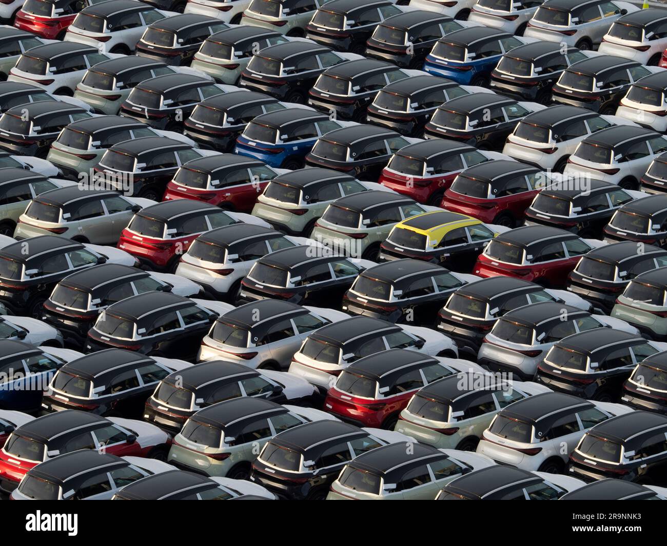 Pure geometry - endless rows of newly imported cars arrayed onshore in ...