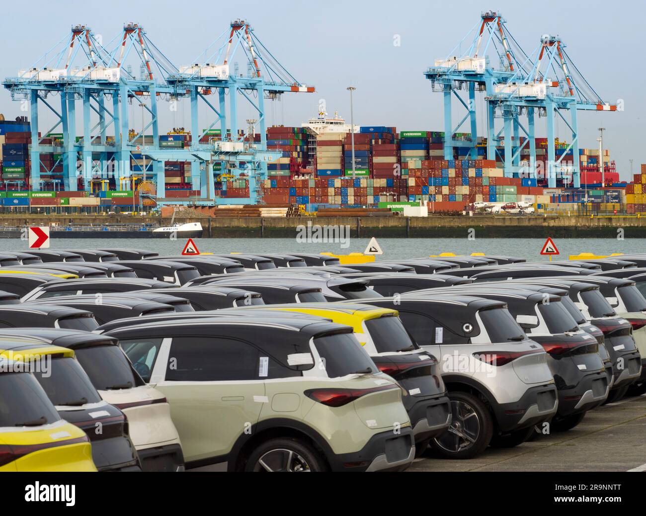 Lines of just-arrived imported cars on the dockside at Zeebrugge ...