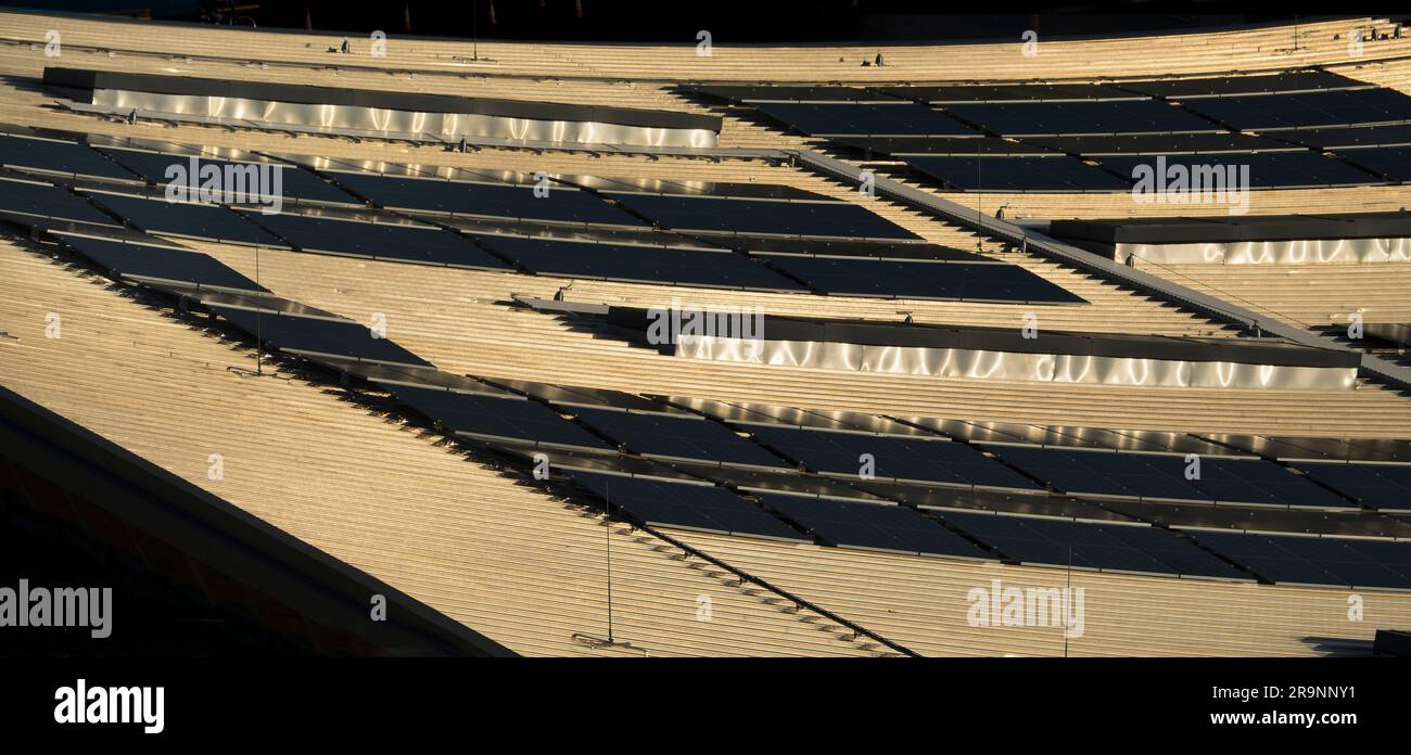 Looking down from a moored cruise ship onto the curved roof of the ...