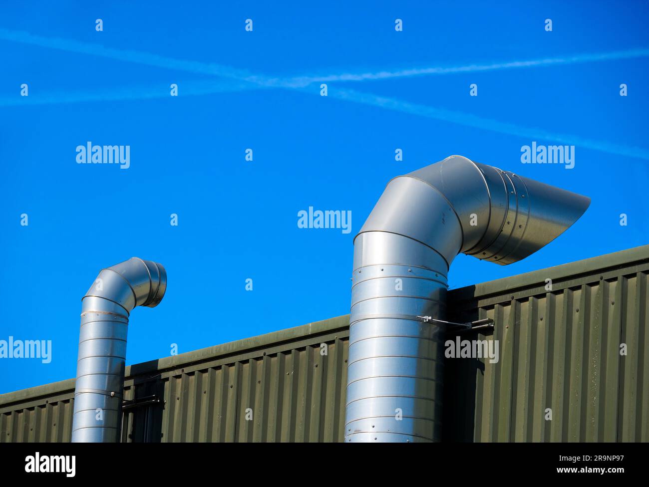Pipes and vapour trails seen on an industrial estate in Sandford ...
