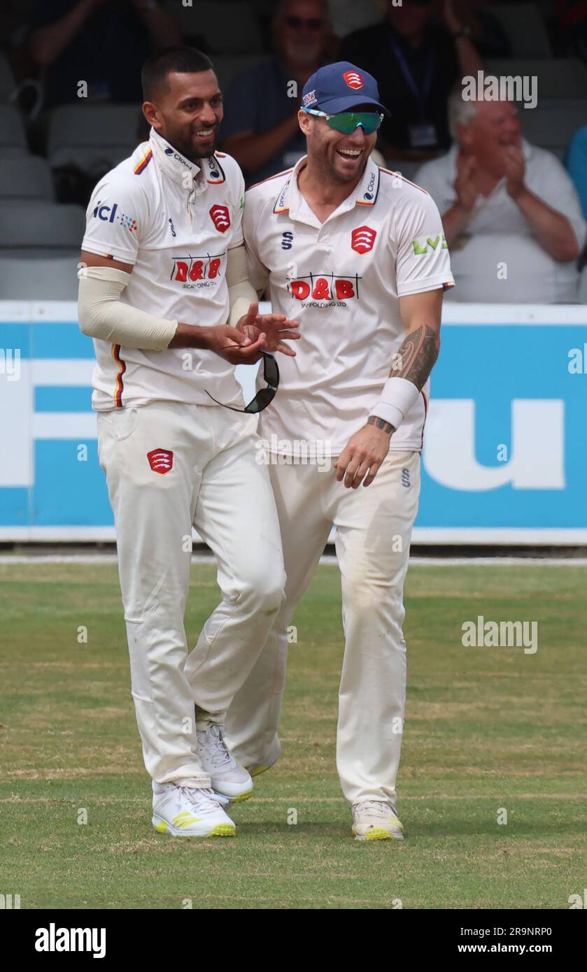 L-R Essex's Feroze Khushi celebrates his catch of Dan Mousley of ...