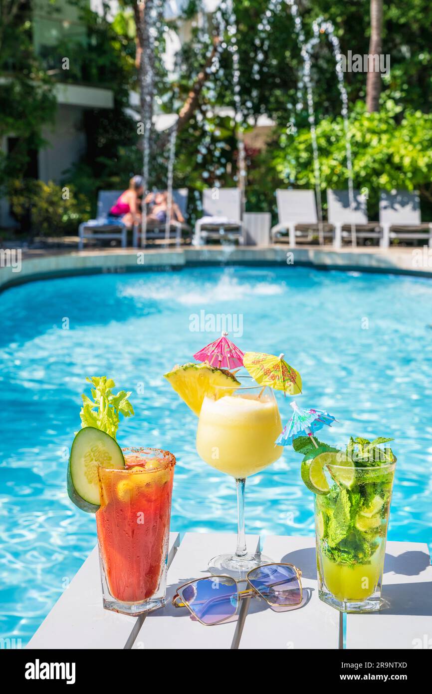 Three drinks pool hi-res stock photography and images - Alamy