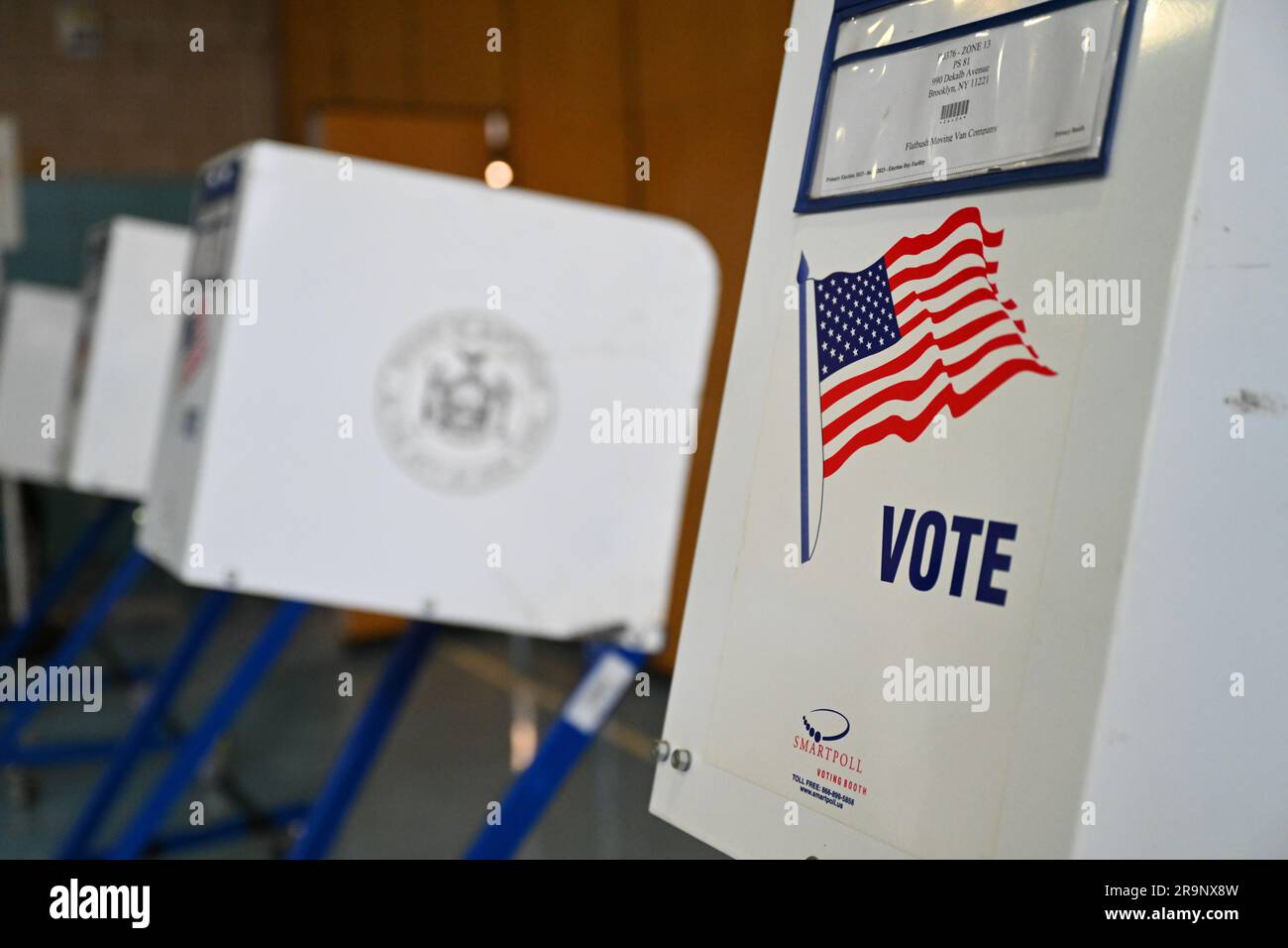 Voting booths in the 2023 New York City primary election at PS 81 on ...