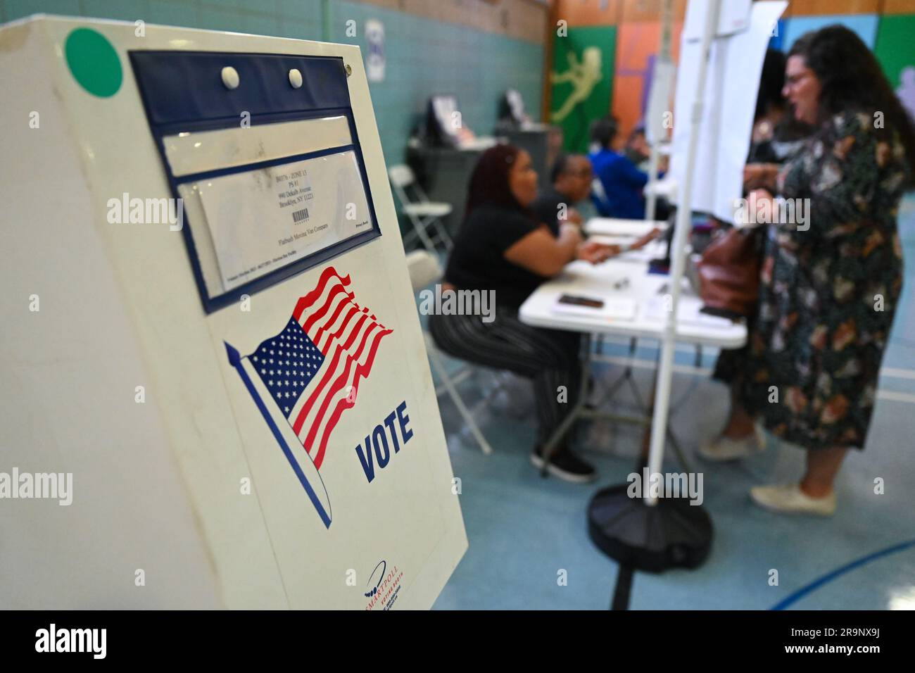 People vote in the 2023 New York City primary election at PS 81 on June ...