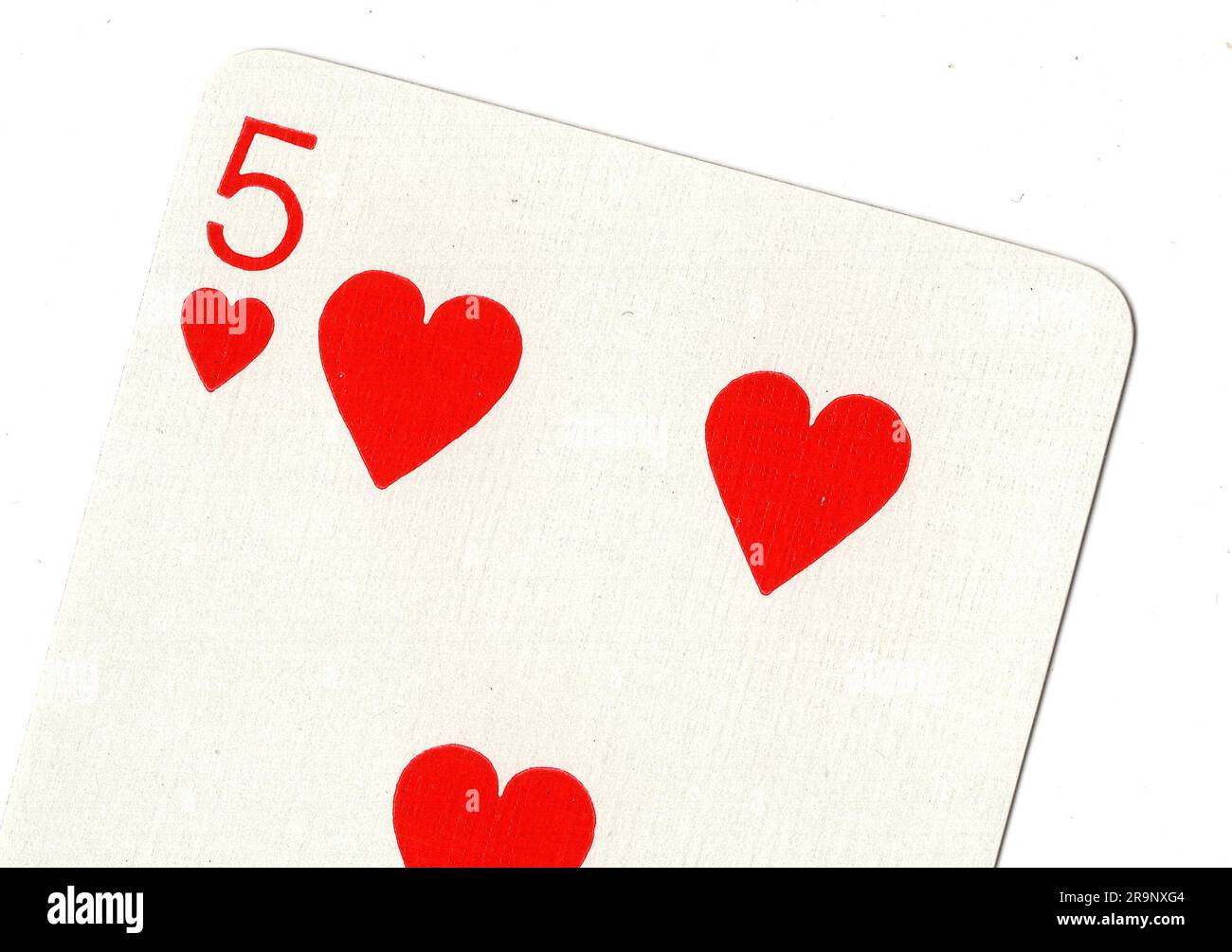 A vintage five of hearts playing card on a white background Stock Photo ...