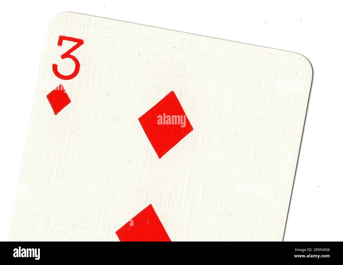 A vintage three of diamonds playing card on a white background Stock ...