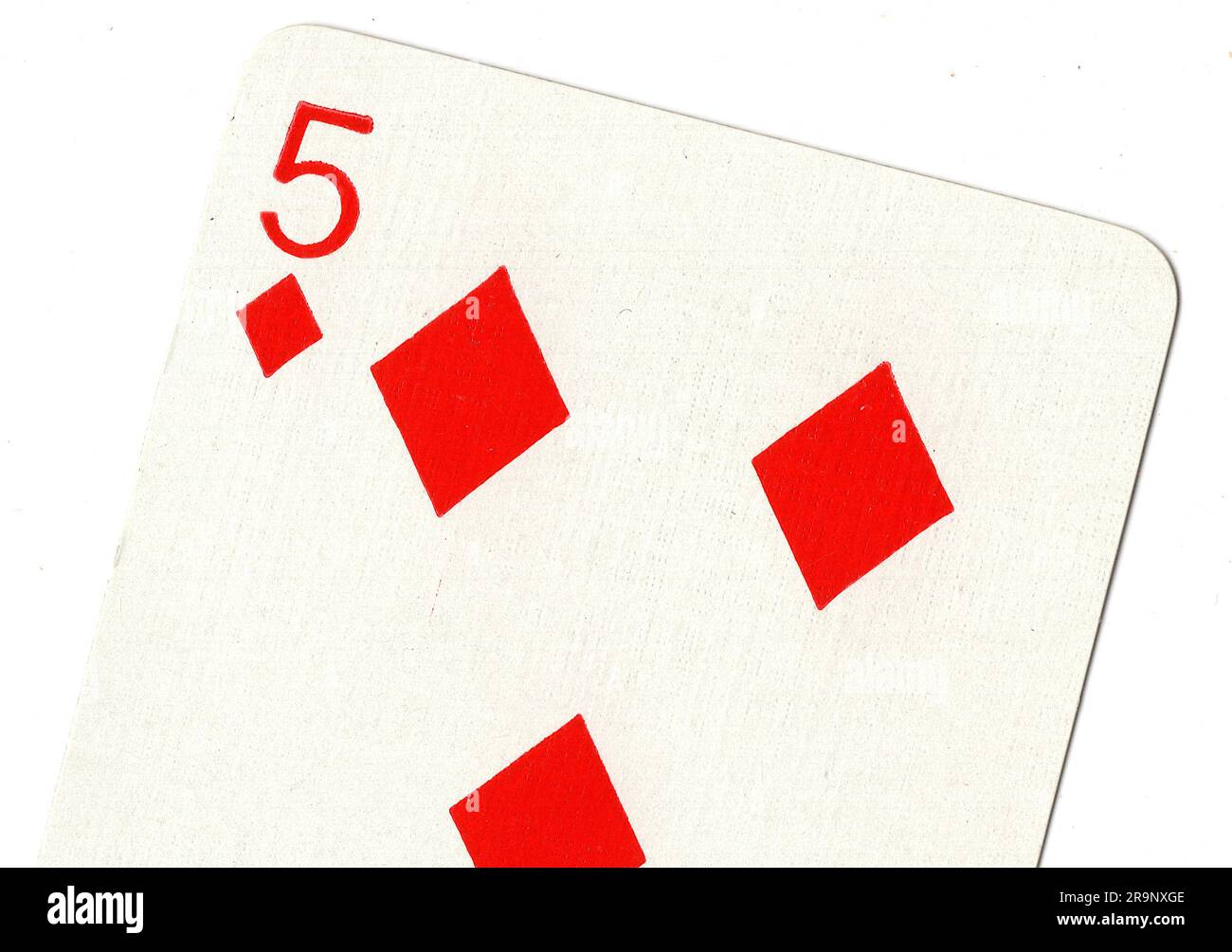 A vintage five of diamonds playing card on a white background Stock ...