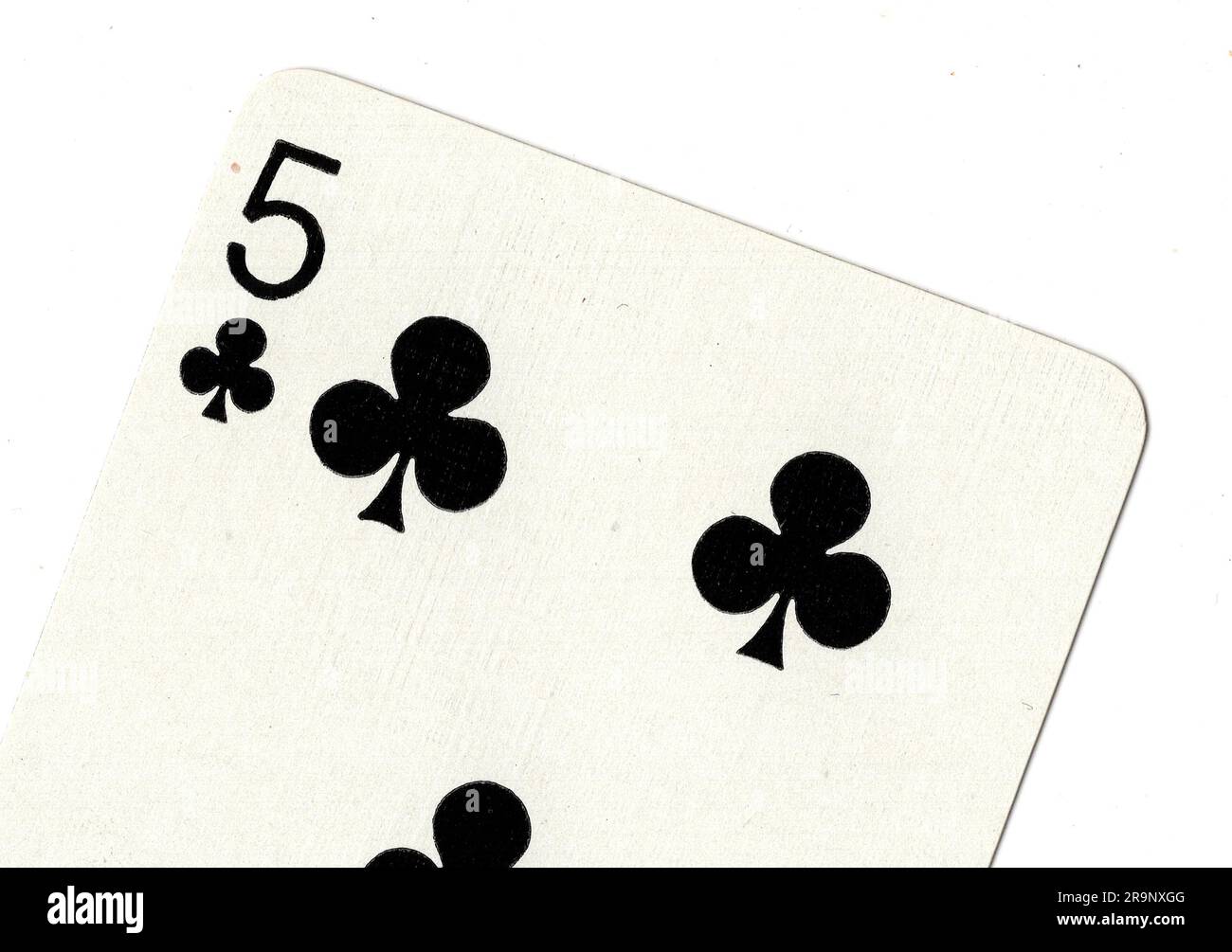 A vintage five of clubs playing card on a white background Stock Photo ...