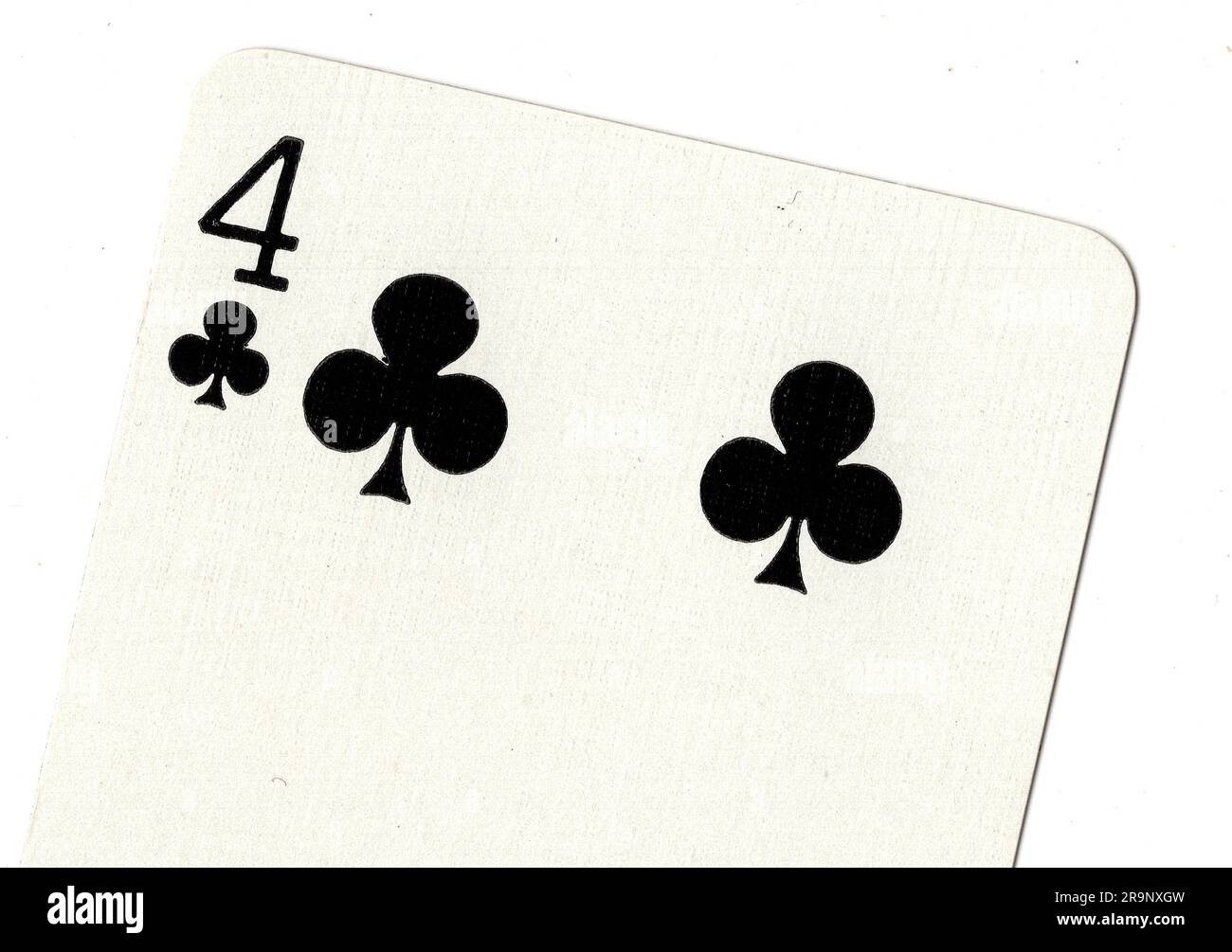 A vintage four of clubs playing card on a white background Stock Photo ...