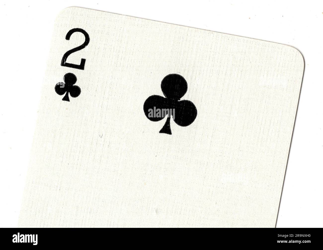 A vintage two of clubs playing card on a white background Stock Photo ...