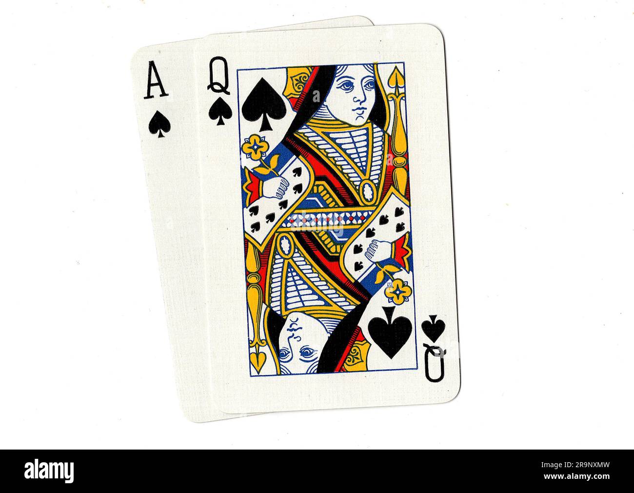 Vintage playing cards showing an ace of spades and a queen of spades on ...