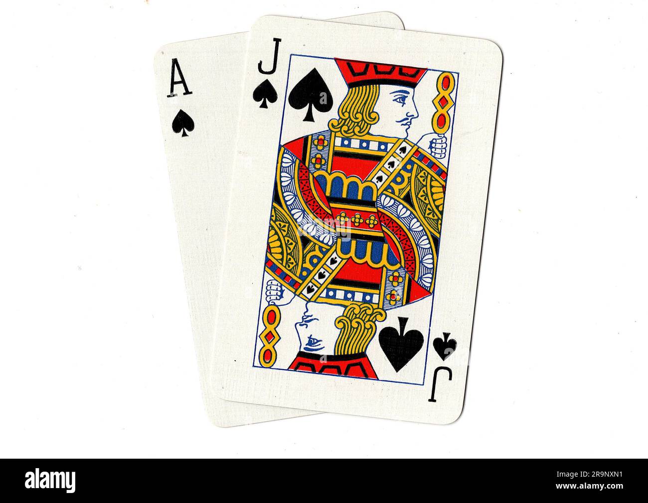 Vintage playing cards showing an ace of spades and a jack of spades on ...