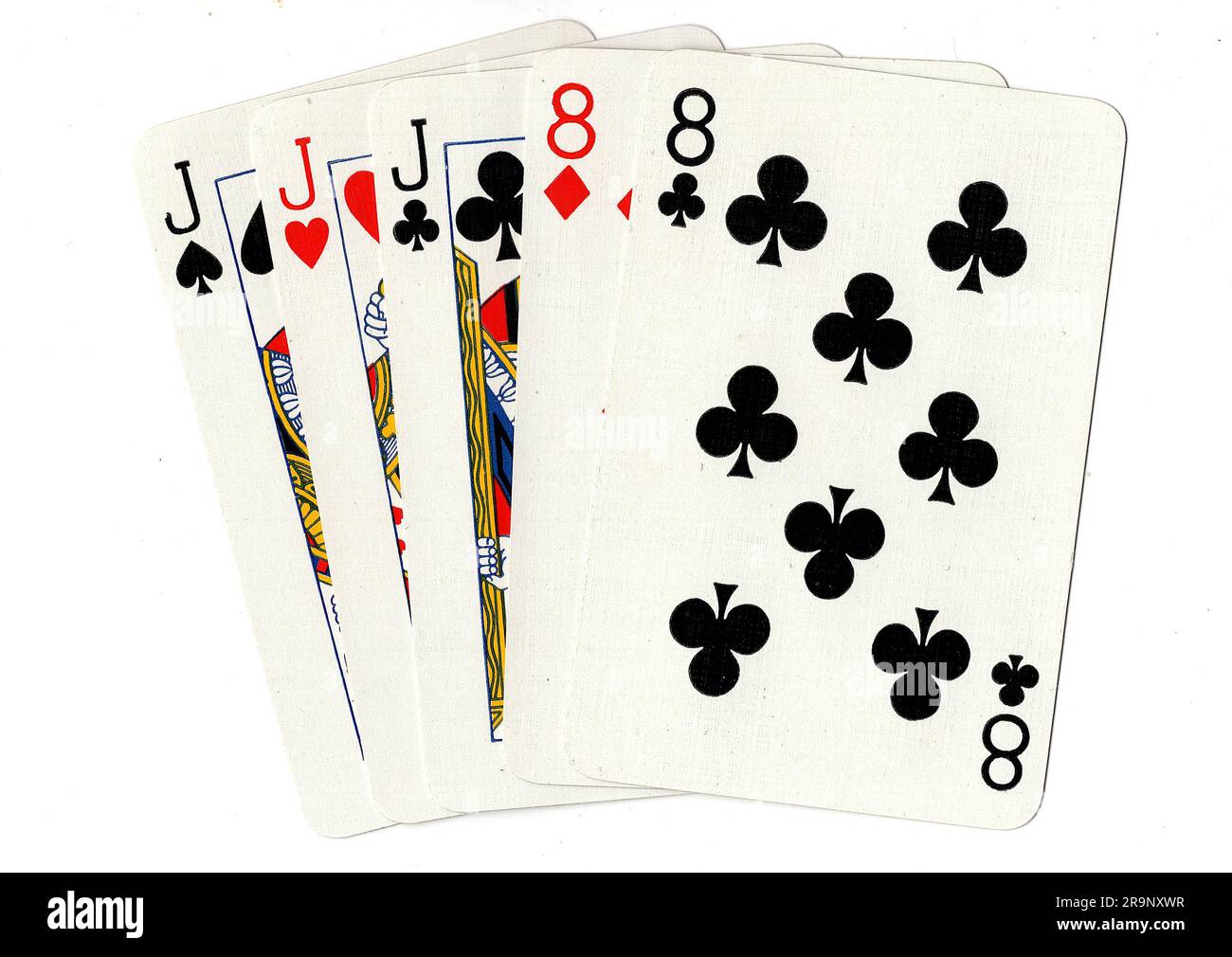 Playing cards in a poker hand showing a full house of jacks over eights ...