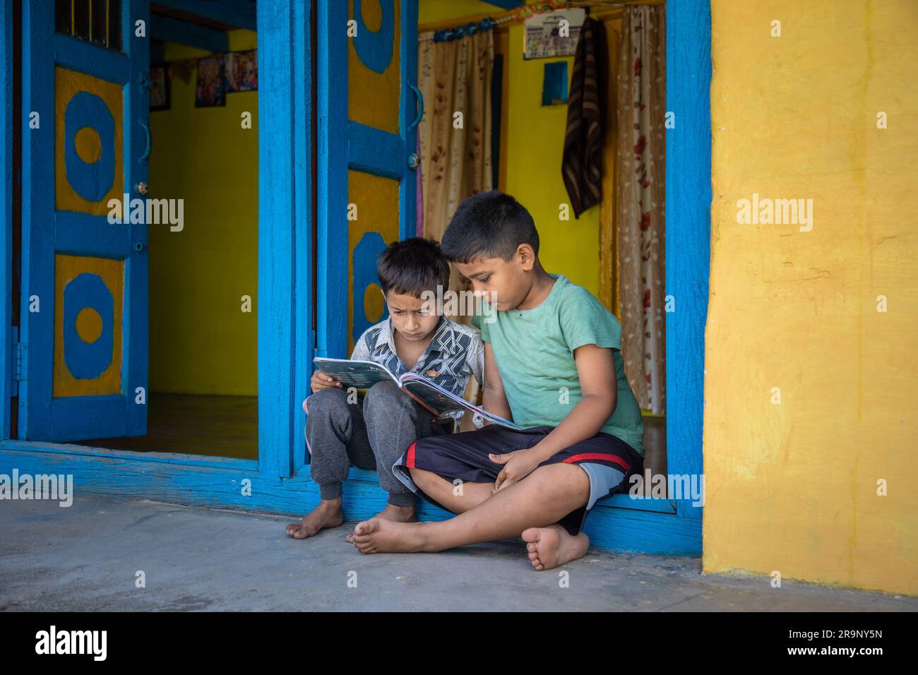 indian rural kids studying together. concept of education, technology ...