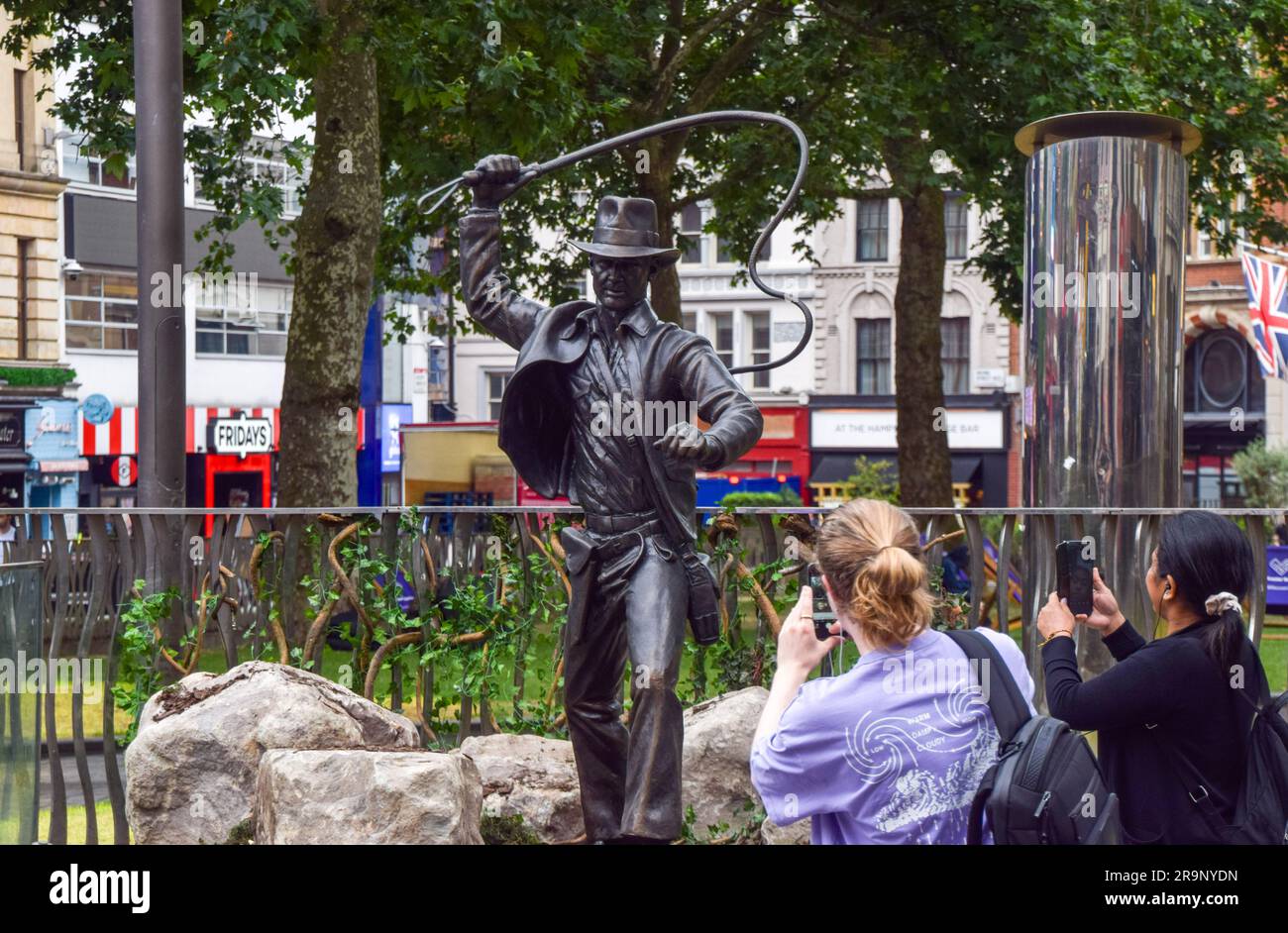 London, England, UK. 28th June, 2023. Passers-by take photos of the new ...